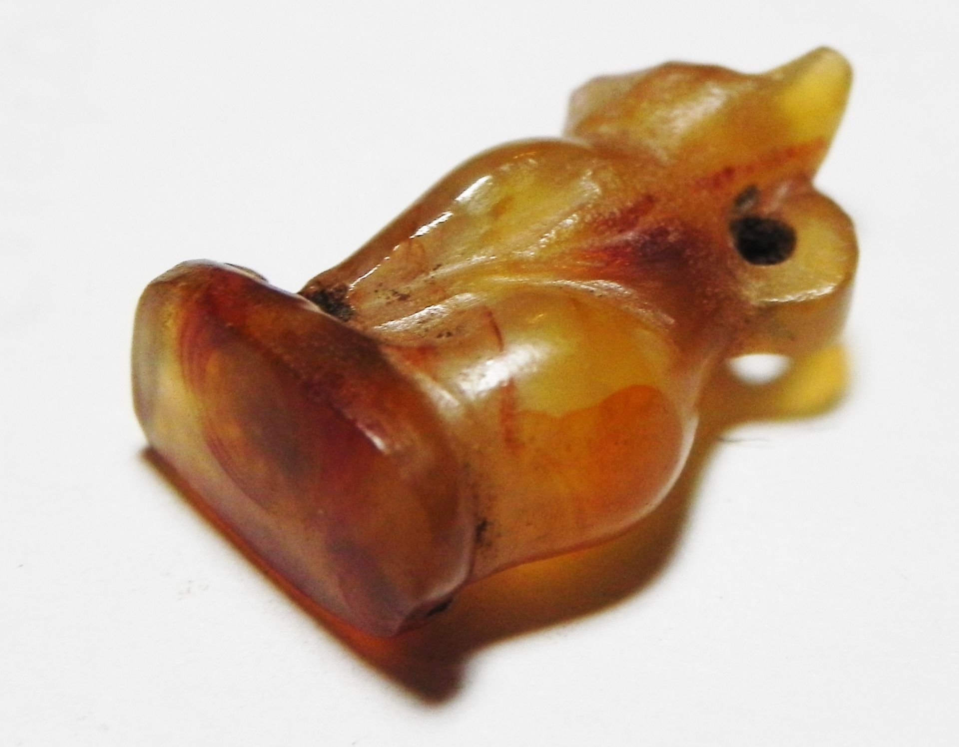ANCIENT EGYPT, NEW KINGDOM CARNELIAN CAT AMULET. 1400 B.C