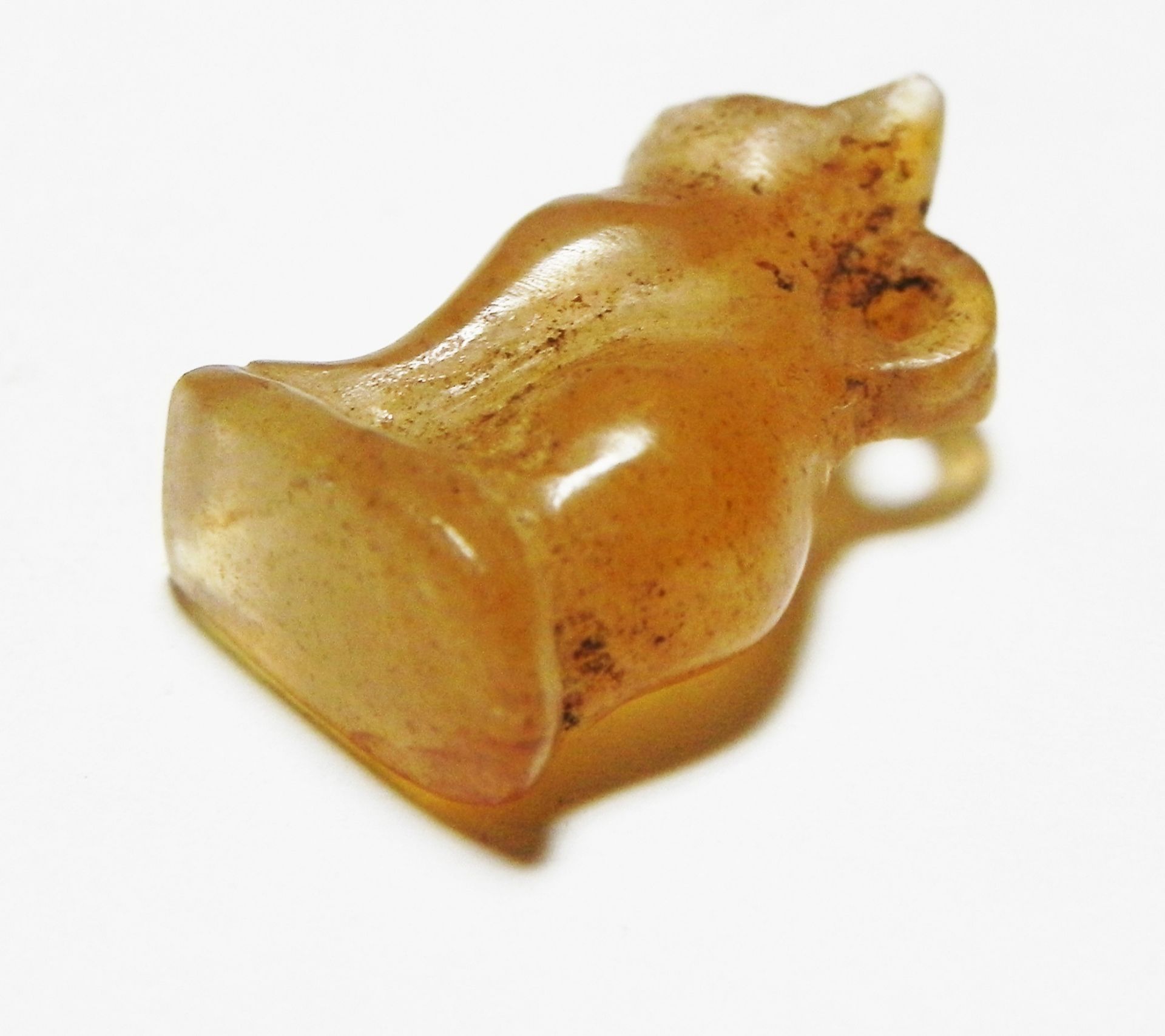 ANCIENT EGYPT, NEW KINGDOM CARNELIAN CAT AMULET. 1400 B.C