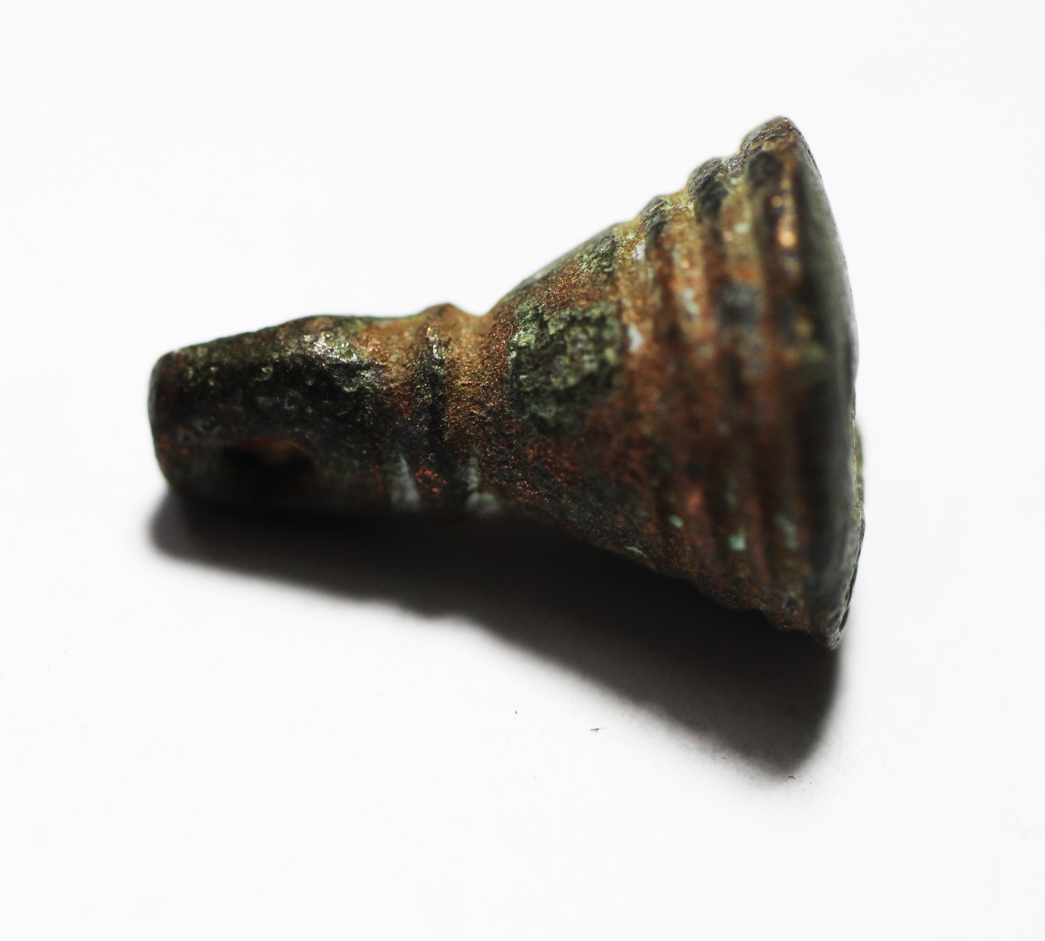 Bronze stamp seal with an ibex on its base. Iron Age II, c. 7th century BC.