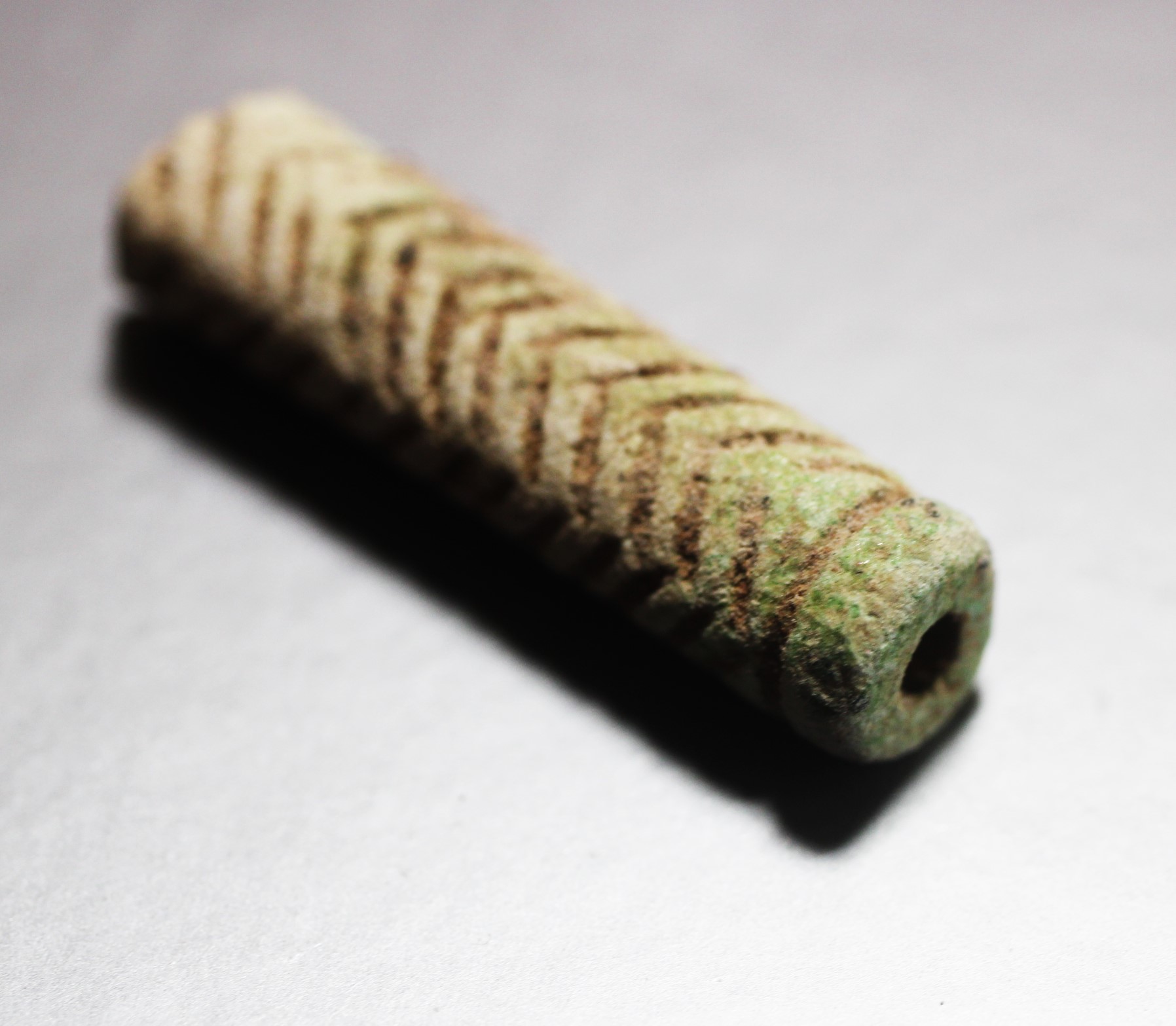 LATE BRONZE AGE. 1400 - 1200 B.C. FAIENCE CYLINDER SEAL.