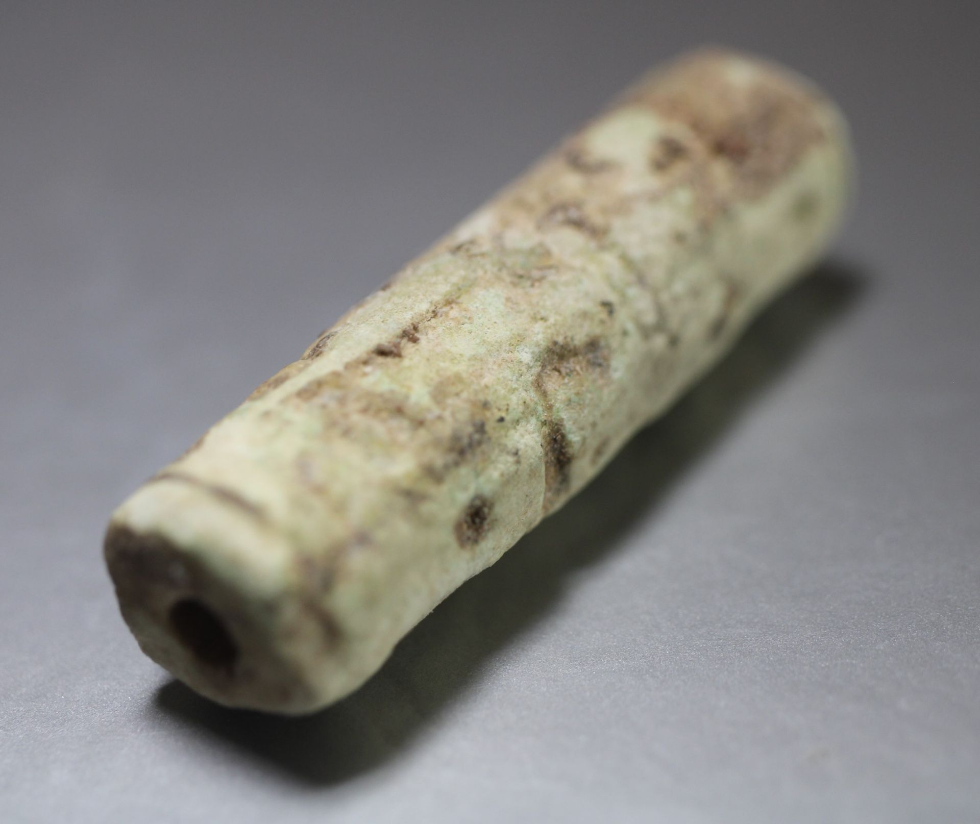 LATE BRONZE AGE. 1400 - 1200 B.C. STONE CYLINDER SEAL.