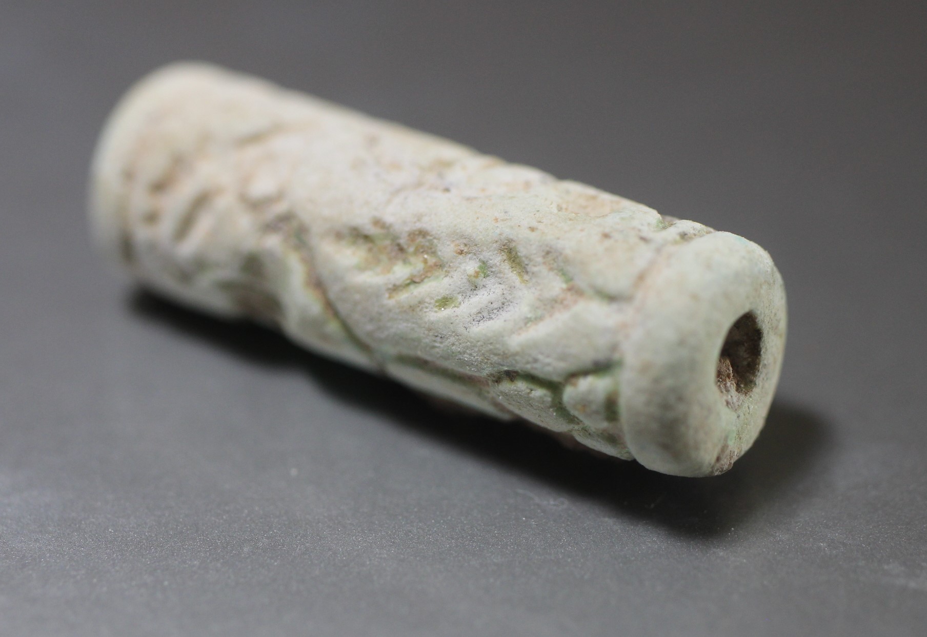 LATE BRONZE AGE. 1400 - 1200 B.C. STONE CYLINDER SEAL.