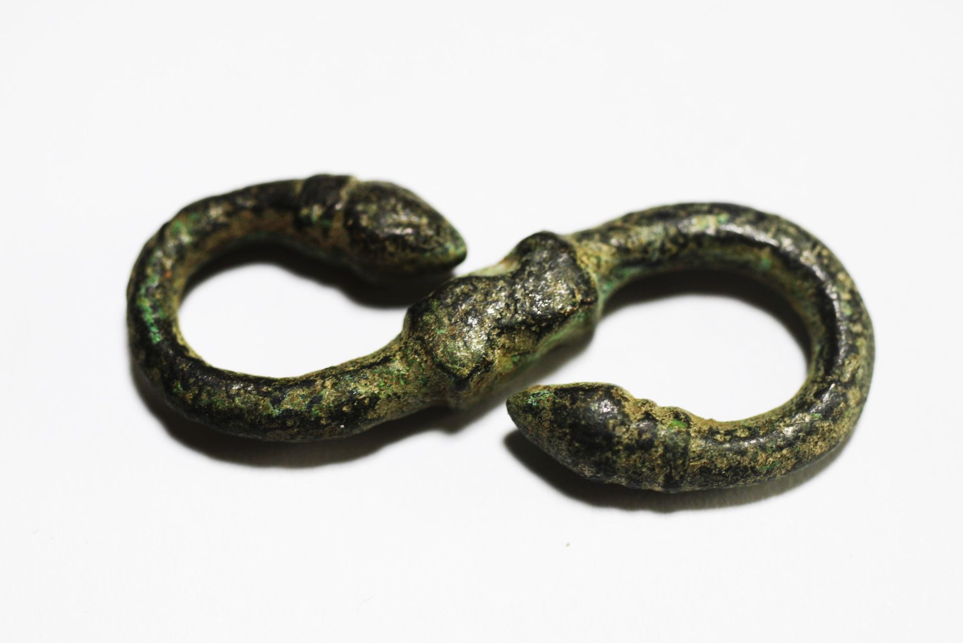 ANCIENT ROMAN BRONZE S-SHAPED SERPENT CLASPS. 200 A.D