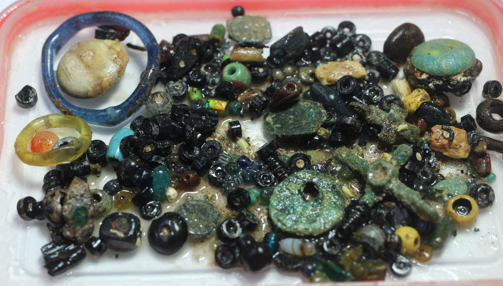 ANCIENT BYZANTINE BEADS AND BRONZE CROSSES. 1000 A.D