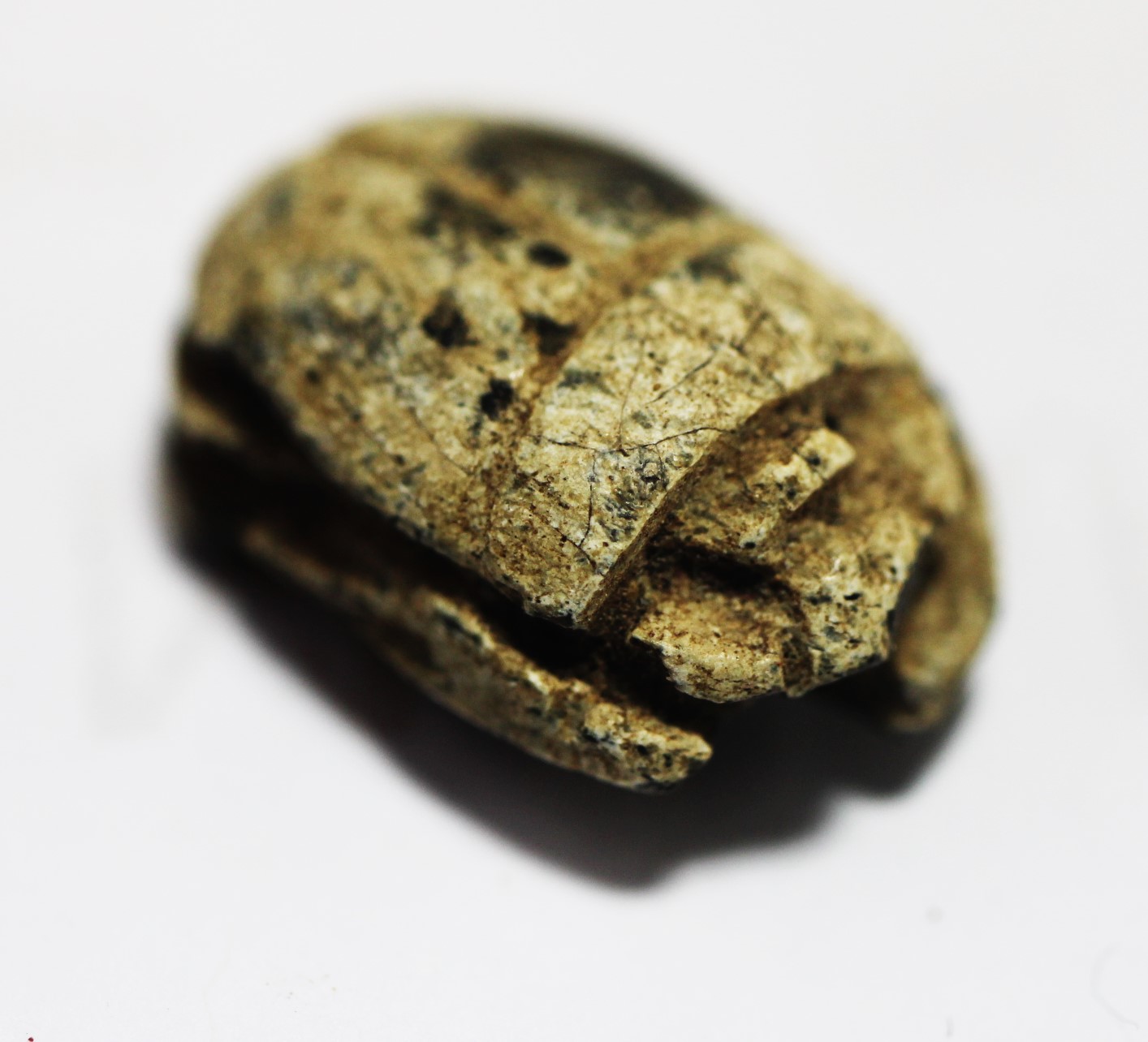 ANCIENT EGYPT. NEW KINGDOM STONE SCARAB. WITH THE NAME OF THUTMOSE III ...