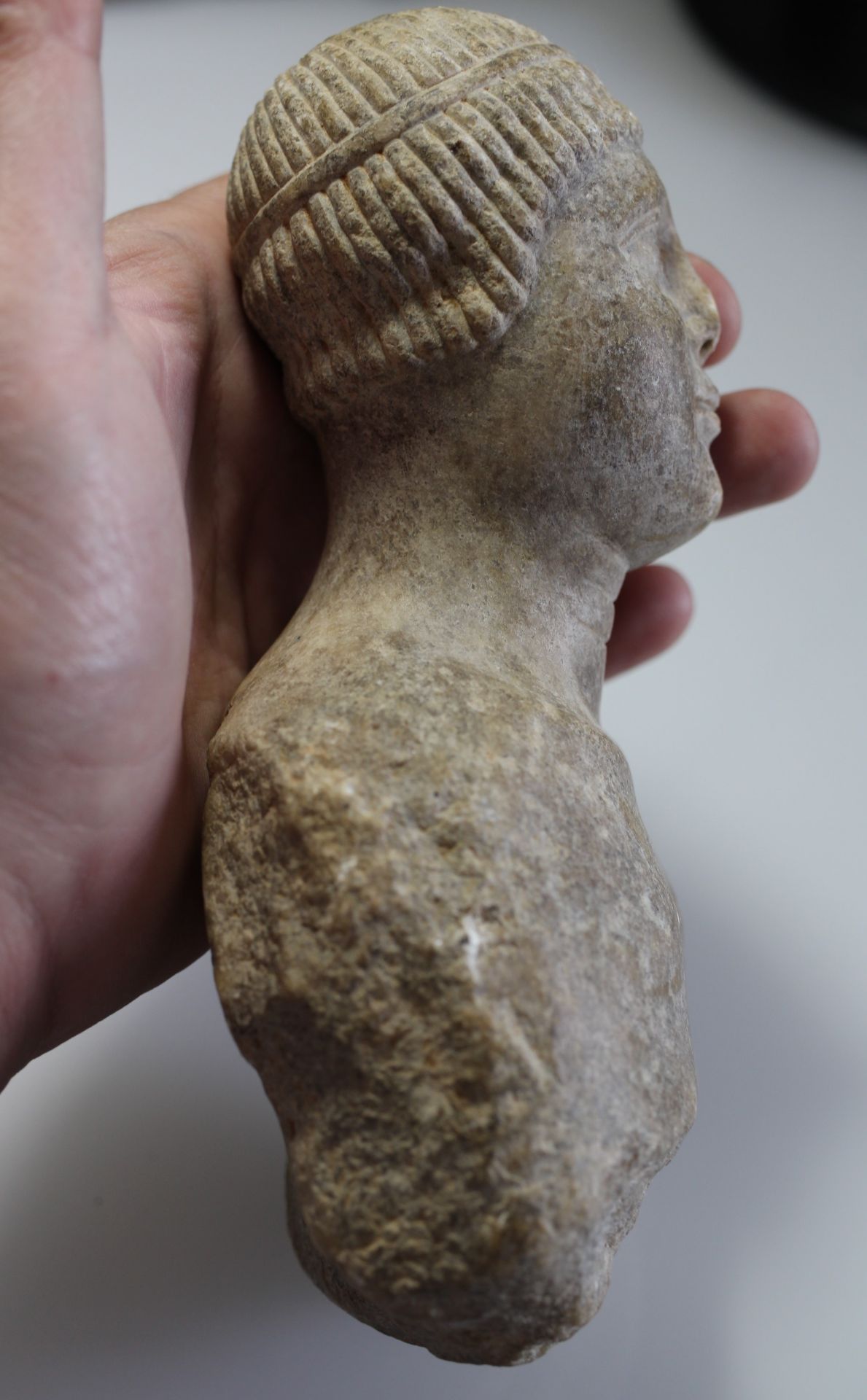 ANCIENT AEGEAN (GREEK) MARBLE BUST OF A MALE. 700 - 600 B.C