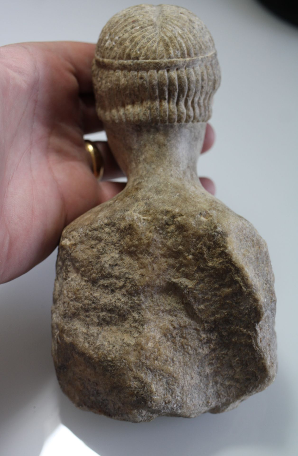 ANCIENT AEGEAN (GREEK) MARBLE BUST OF A MALE. 700 - 600 B.C