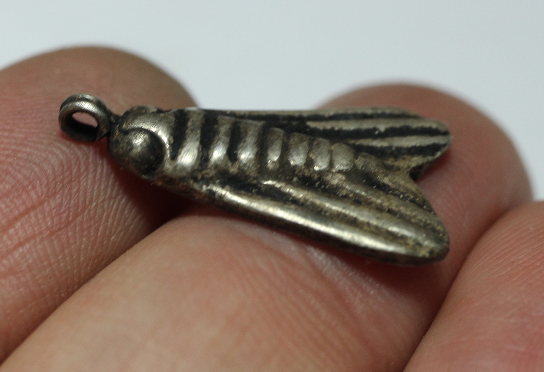 ANCIENT EGYPT. NEW KINGDOM SILVER FLY AMULET. 1250 B.C