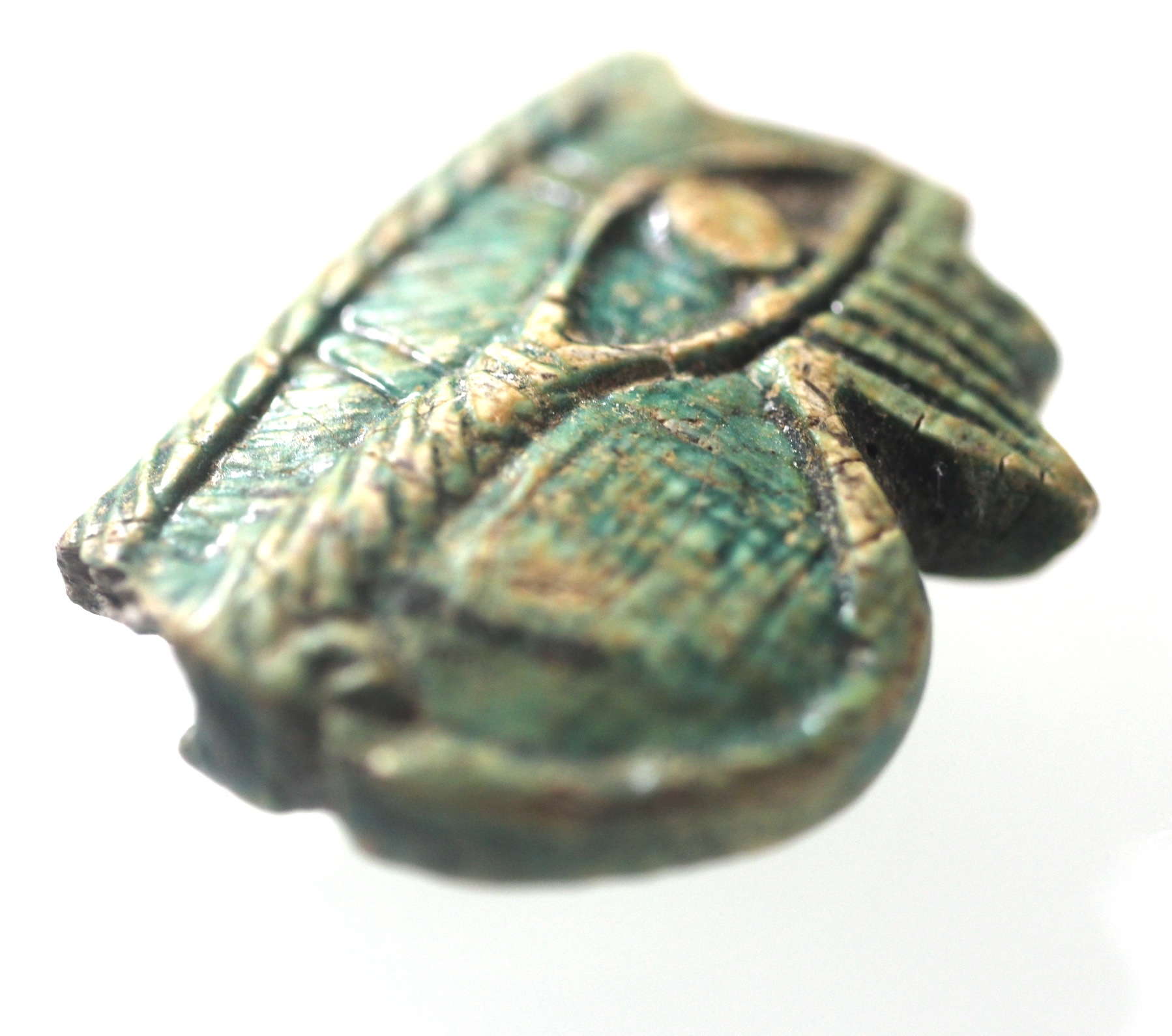 ANCIENT EGYPT. GLAZED STONE EYE OF HORUS AMULET. 600 - 300 B.C