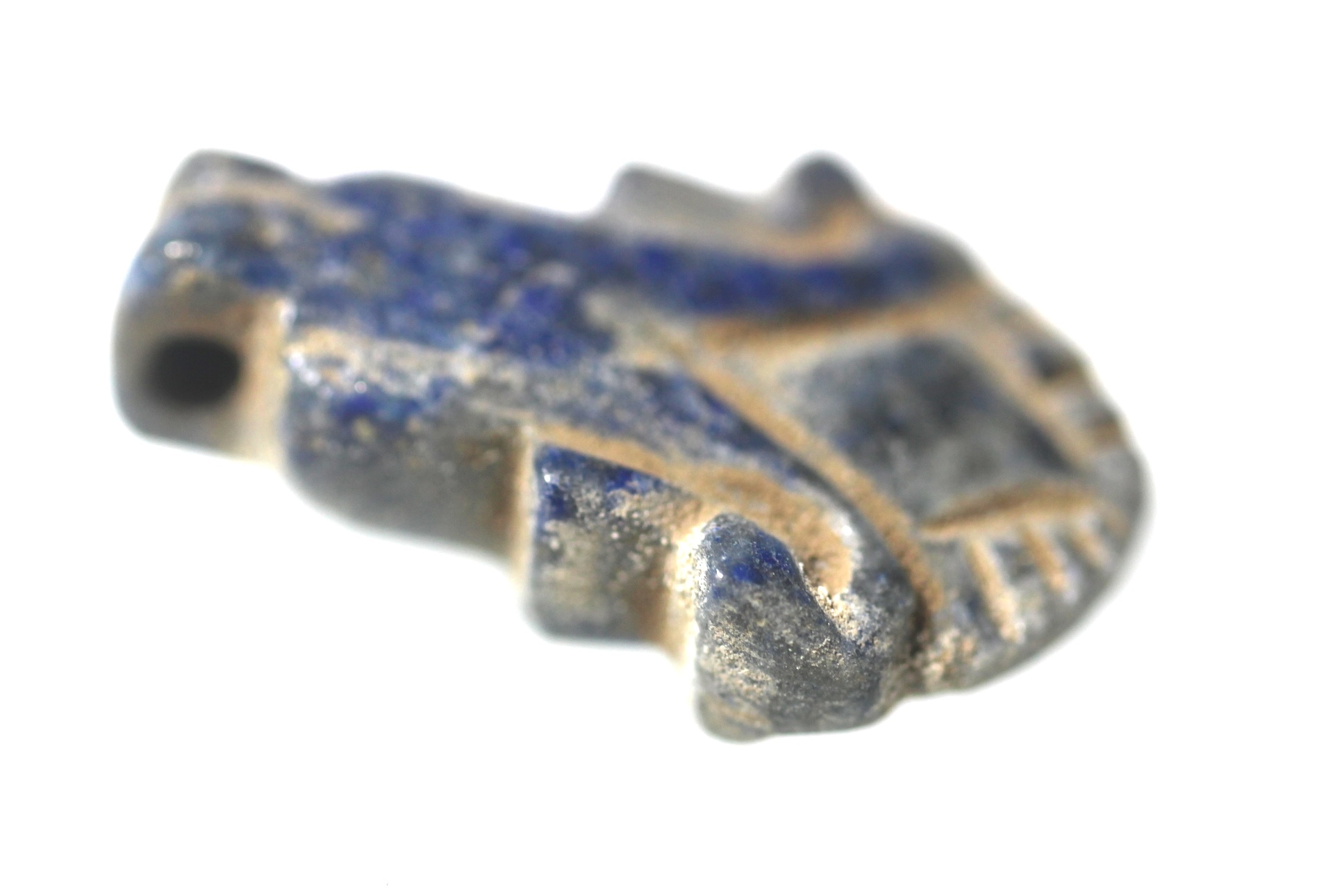 ANCIENT EGYPT. LAPIS LAZULI LOTUS PETAL AMULET. 1250 B.C NEW KINGDOM