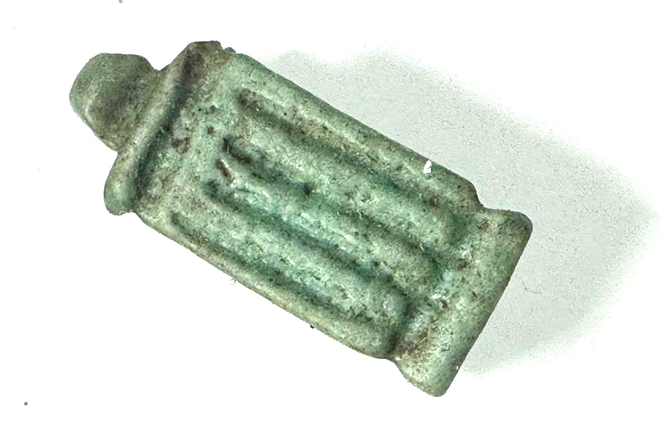 ANCIENT EGYPT. FAIENCE SHRINE AMULET WITH BABY HORUS. 600 - 300 B.C