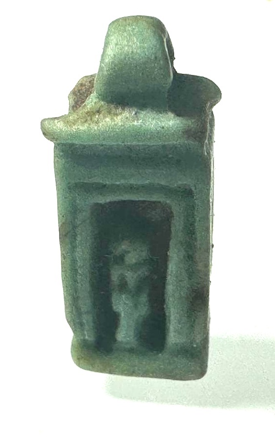 ANCIENT EGYPT. FAIENCE SHRINE AMULET WITH BABY HORUS. 600 - 300 B.C
