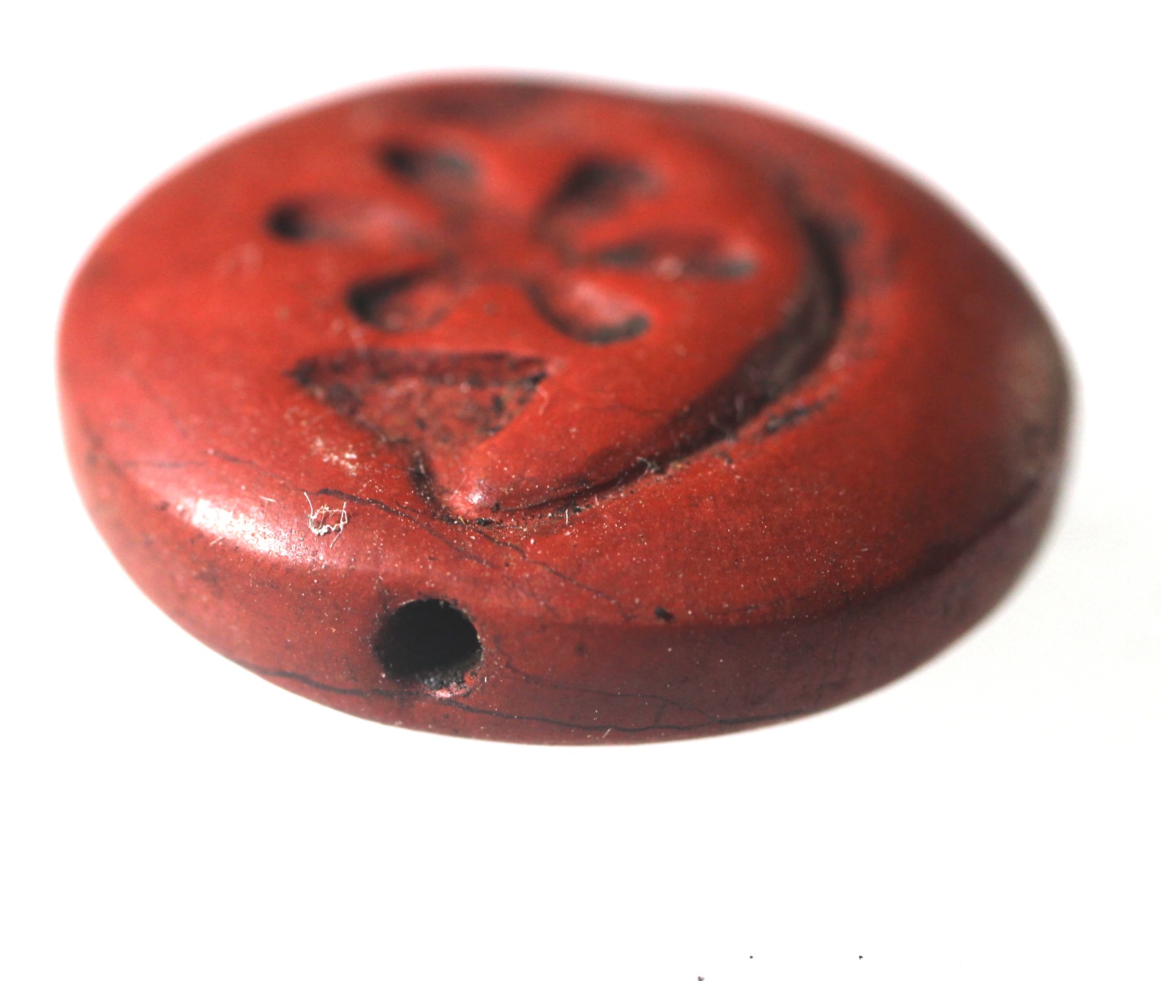 ANCIENT EGYPT. NEW KINGDOM. RED JASPER DISC SHAPED AMULET. 1250 B.C ...
