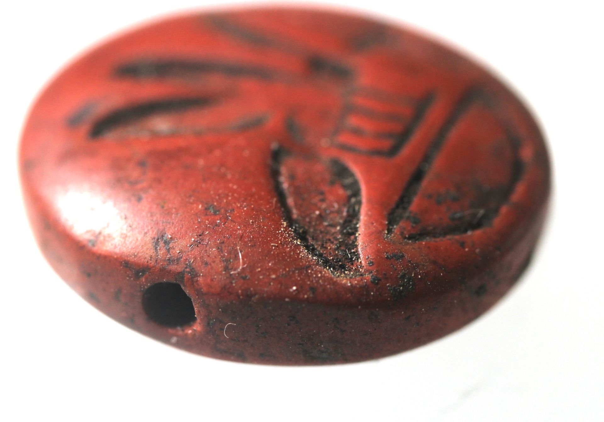 ANCIENT EGYPT. NEW KINGDOM. RED JASPER DISC SHAPED AMULET. 1250 B.C ...